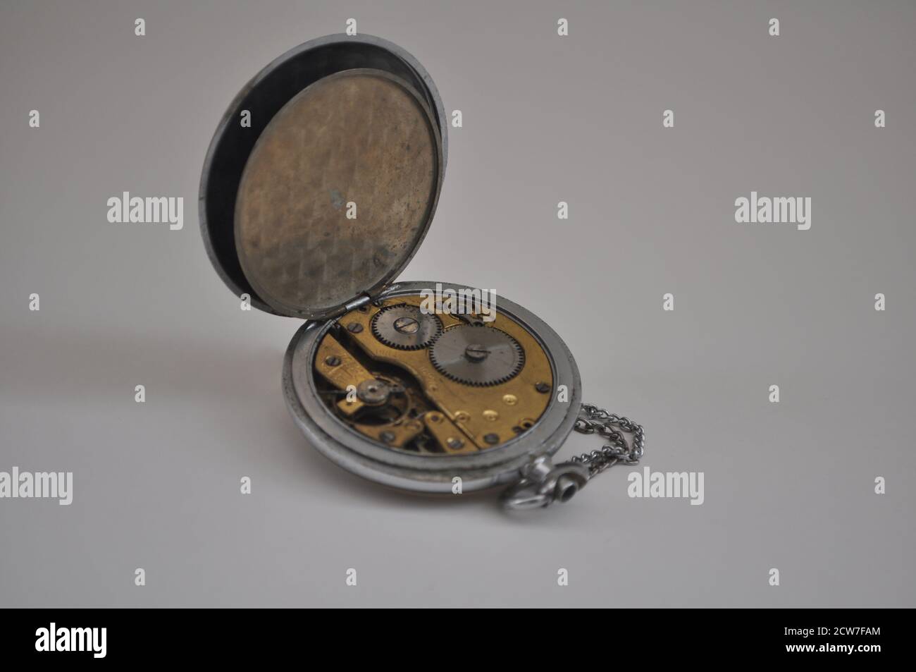 Pocket watch. Vintage pocket watch mechanism, with open back showing ...
