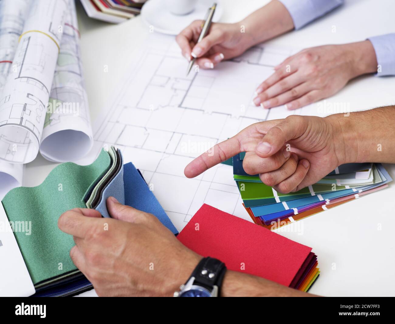 Engineer discussing over document hi-res stock photography and images ...