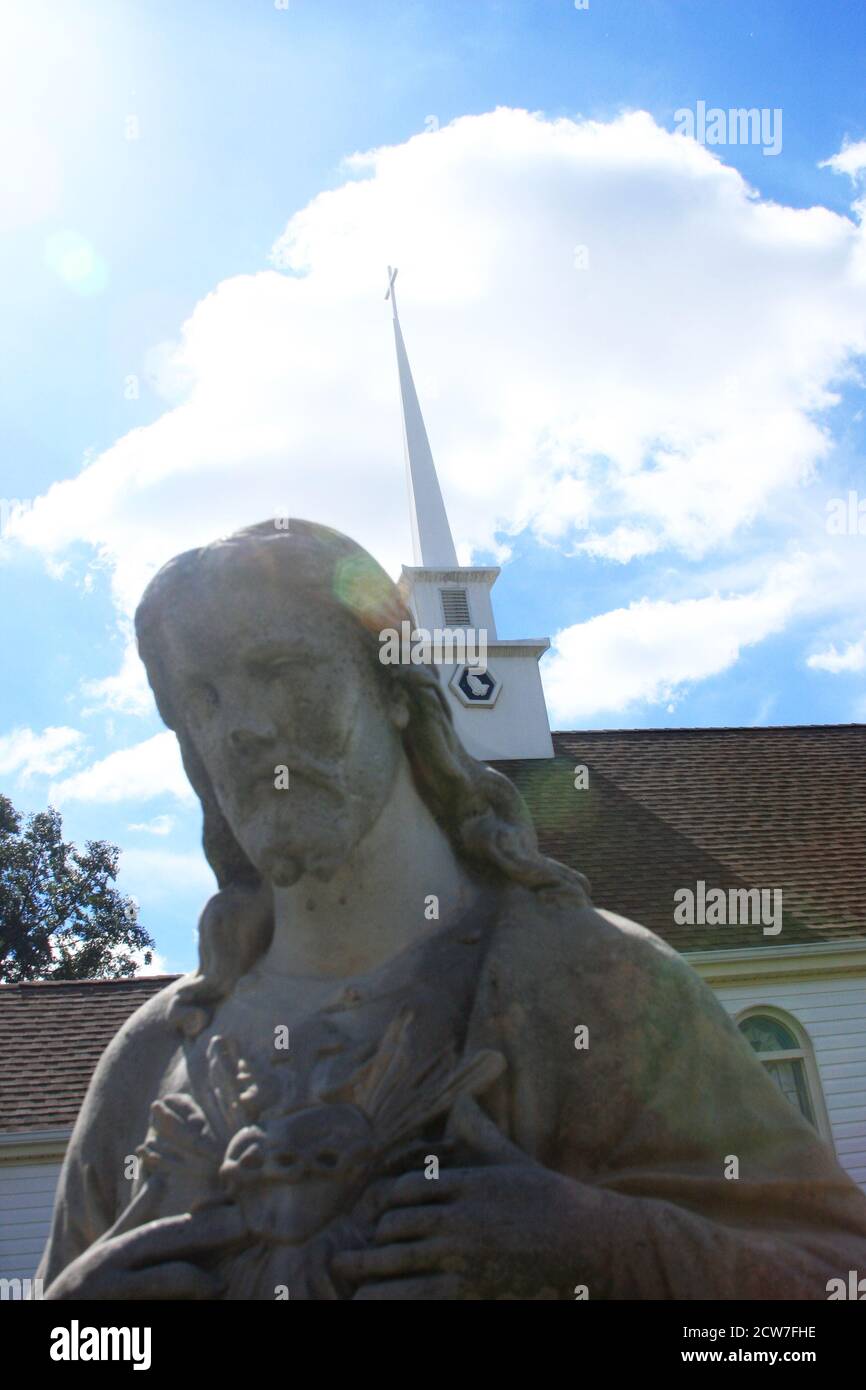 Statue of Jesus in front of a Christian church Stock Photo - Alamy