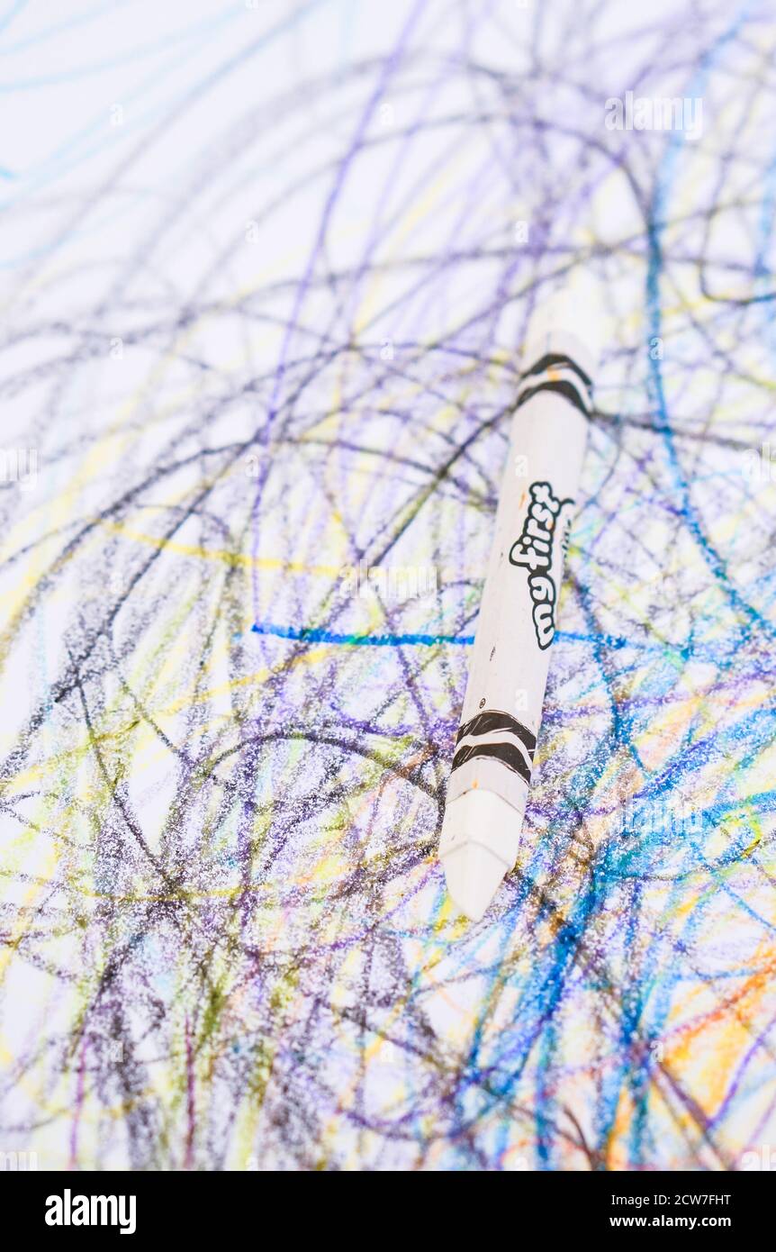 POZNAN, POLAND - May 14, 2016: White Crayon drawing stick on a white ...