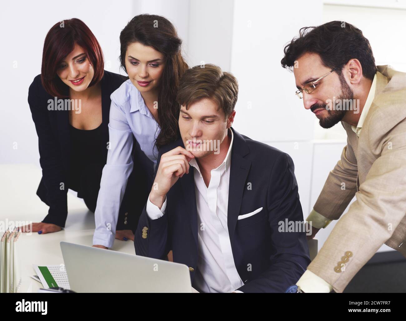 Business people at desk Stock Photo - Alamy