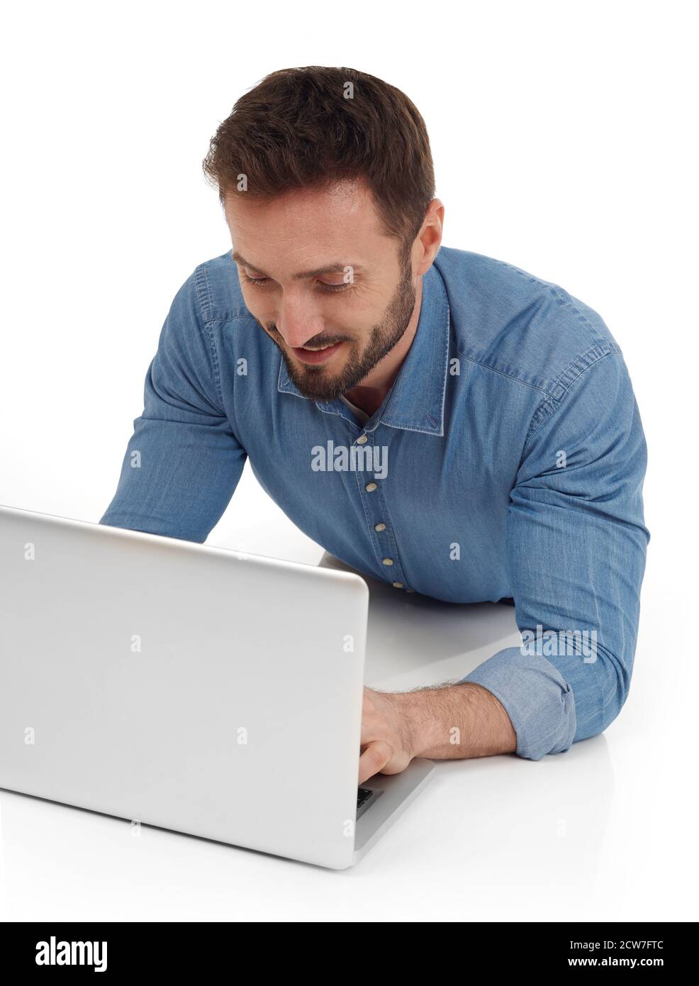 Man with laptop, white background Stock Photo - Alamy