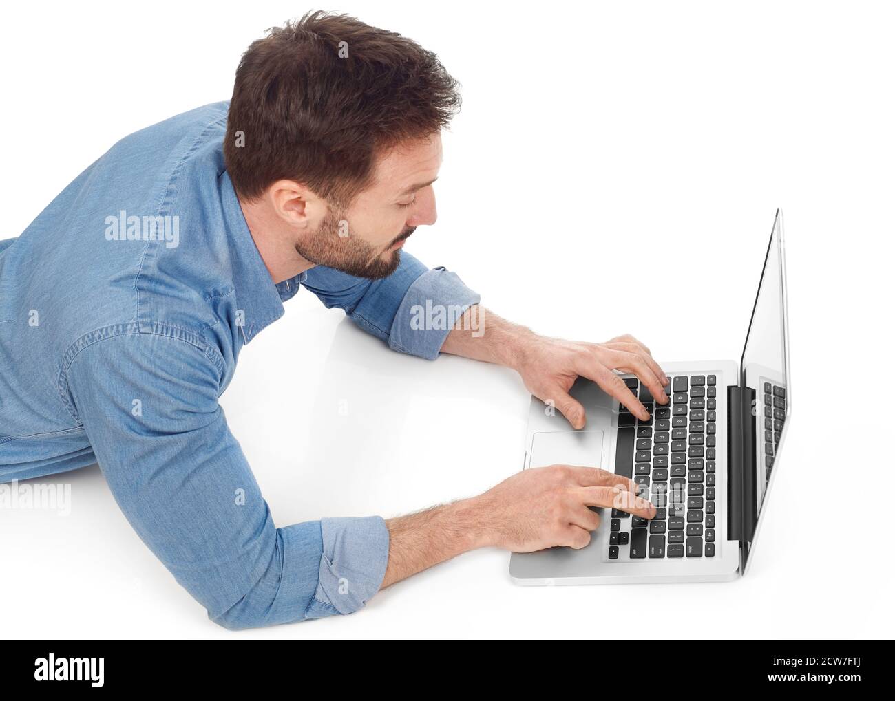 Man with laptop, white background Stock Photo - Alamy