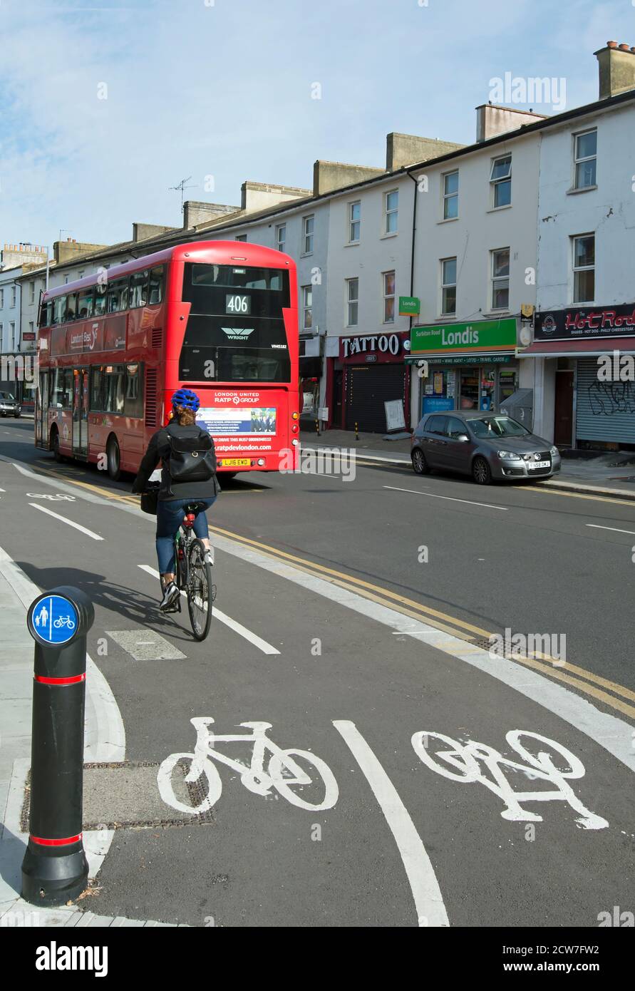 a female cyclist uses a bidirectional cycle track in kingston upon ...