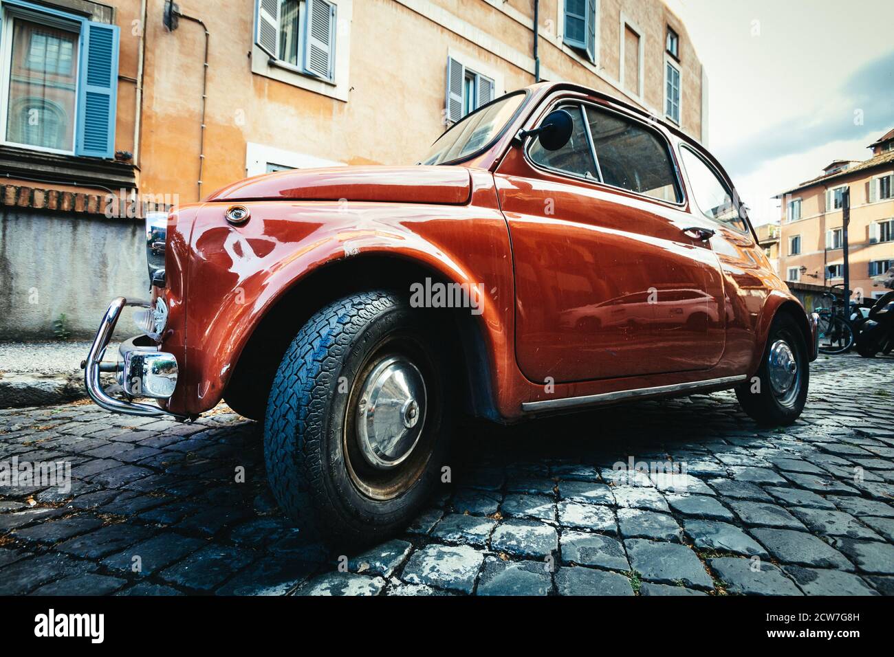 Old compact Italian car Fiat 500 Cinquecento parked in the historic ...