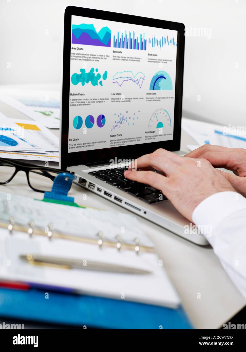Man showing graph and charts Stock Photo - Alamy