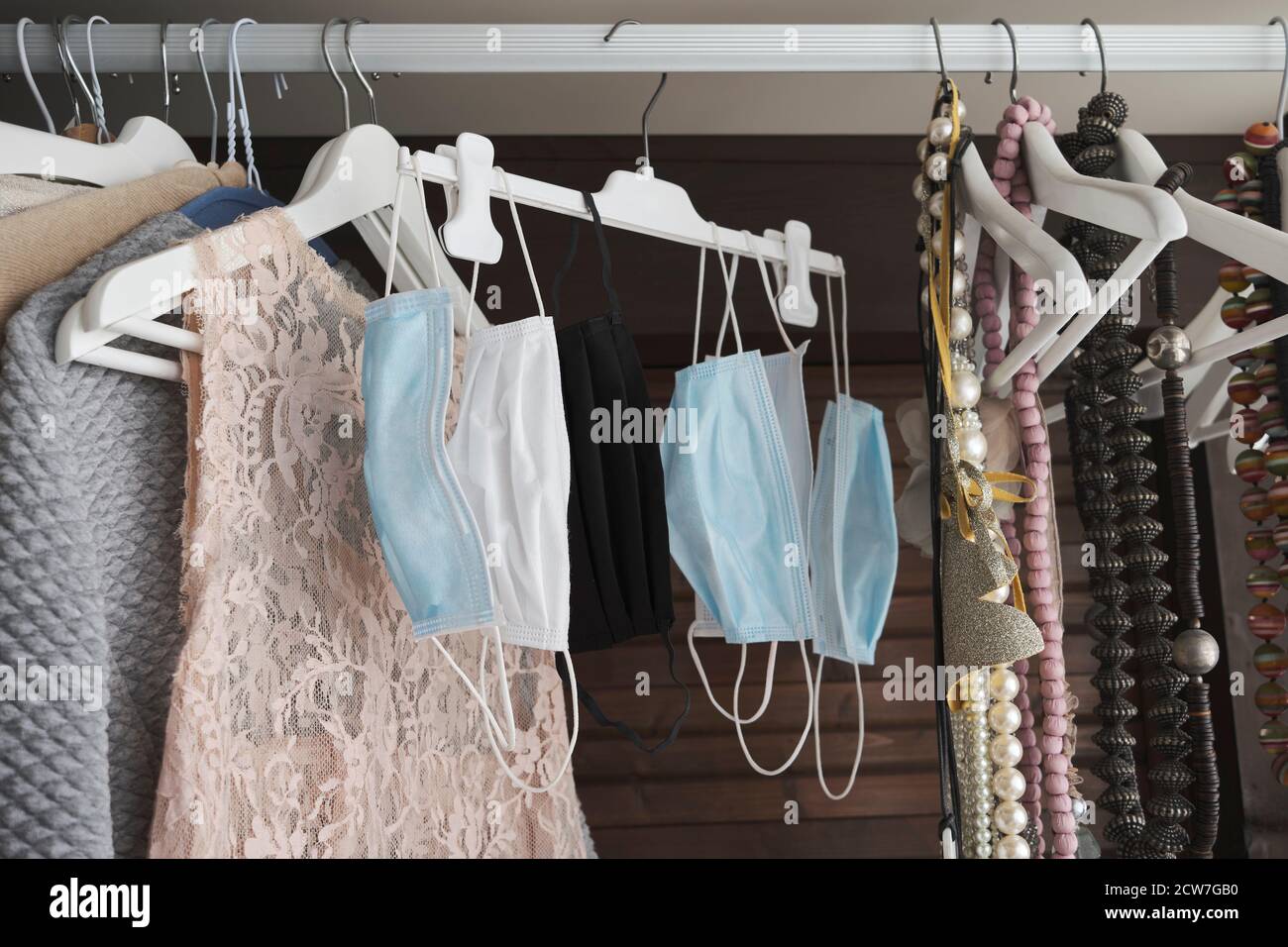 Hanging clothes closet hi-res stock photography and images - Alamy