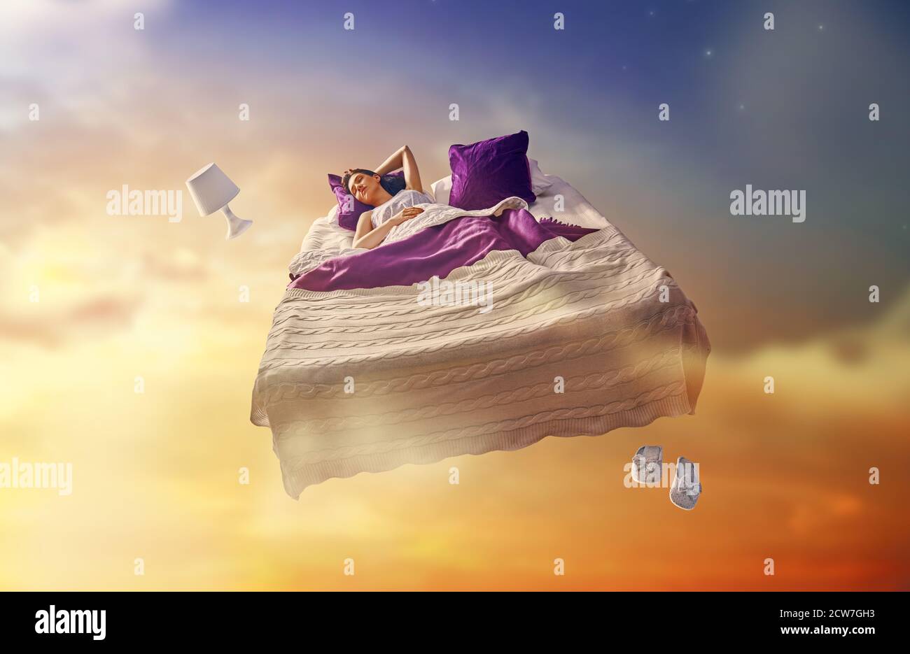 Woman sleep bed cloud hi-res stock photography and images - Alamy
