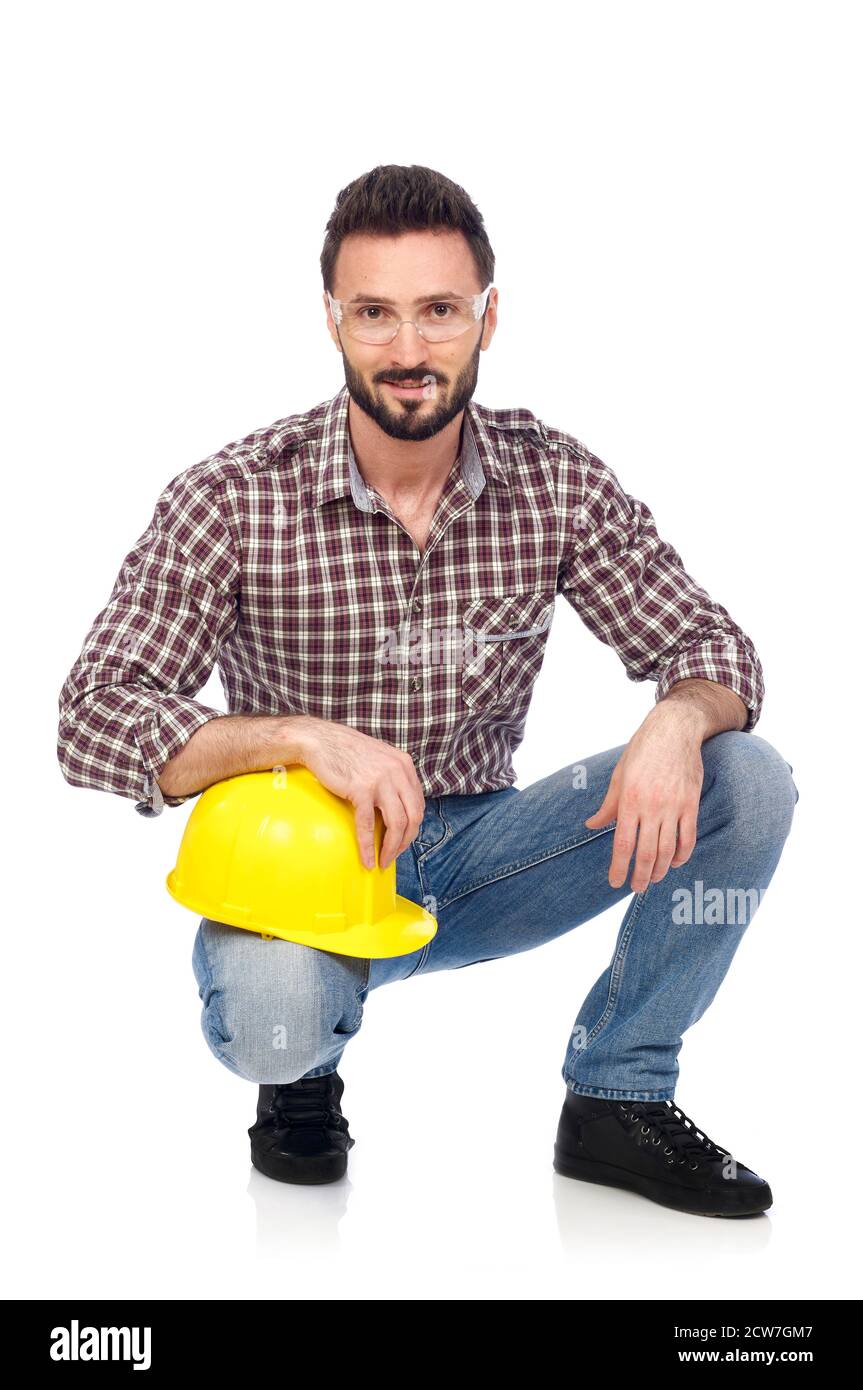 Cheerful carpenter looking at camera, white background Stock Photo - Alamy