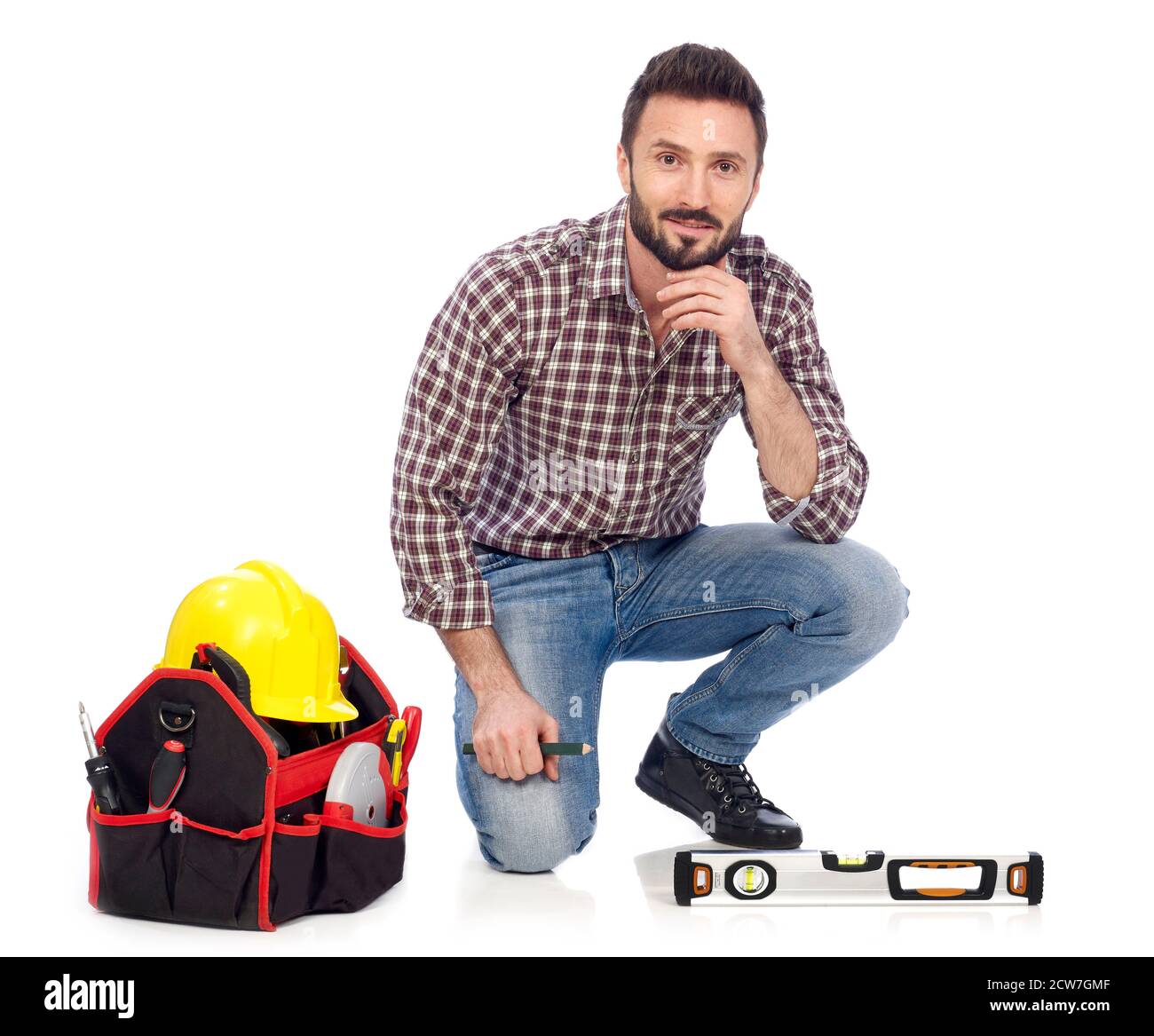 Cheerful carpenter looking at camera, white background Stock Photo - Alamy