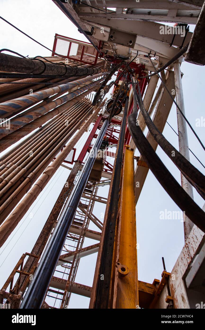 Abstract industrial background on oil deposit. View on oil drilling rig ...