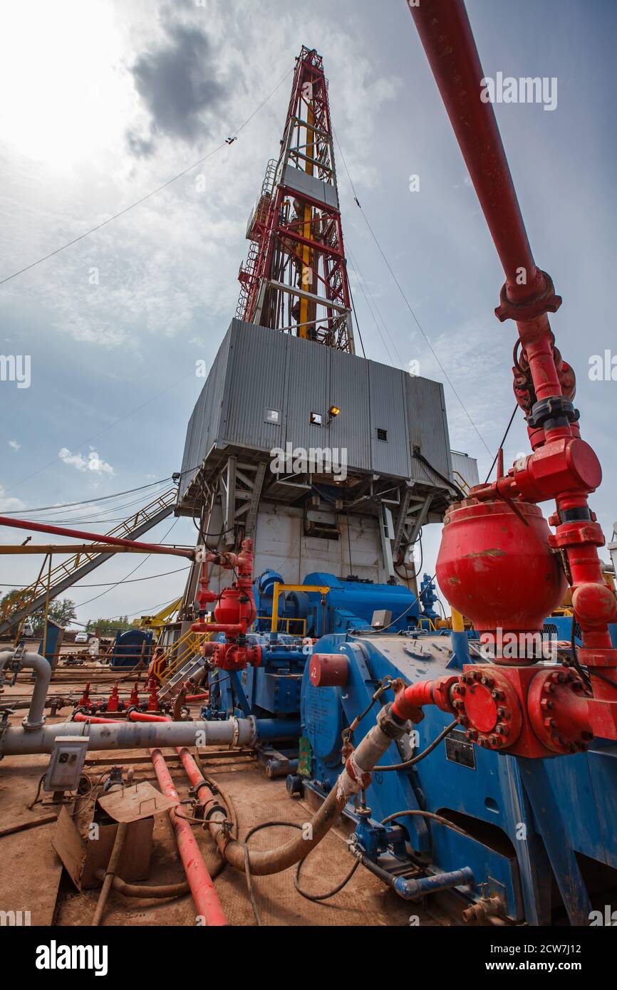 Mud pump for drilling rig. Sky with clouds background. Zhaik-Munai oil ...
