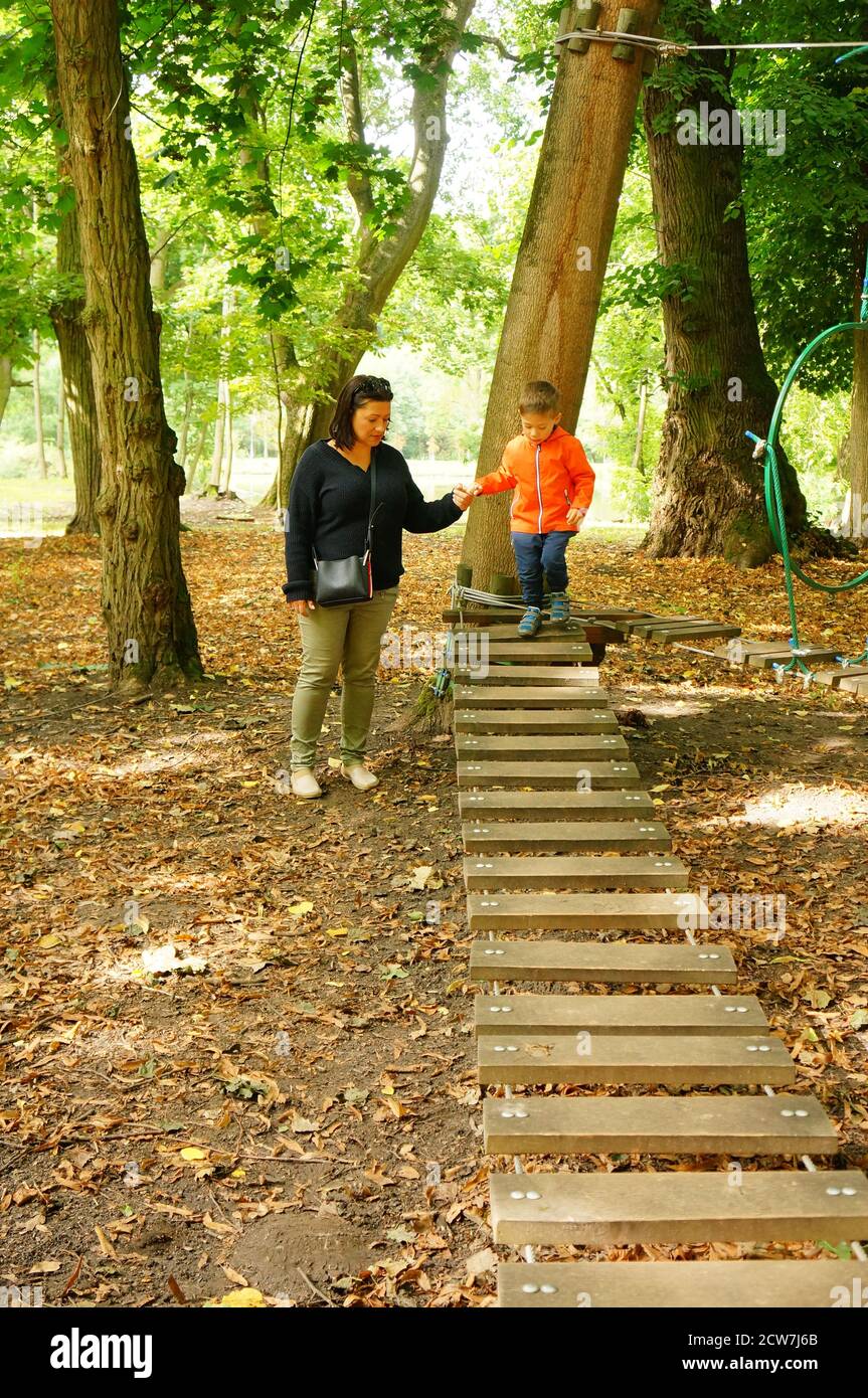 Mother son on obstacle hi-res stock photography and images - Alamy