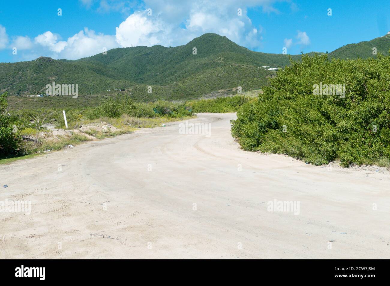 Road leading to orient bay beach on st.maarten Stock Photo - Alamy