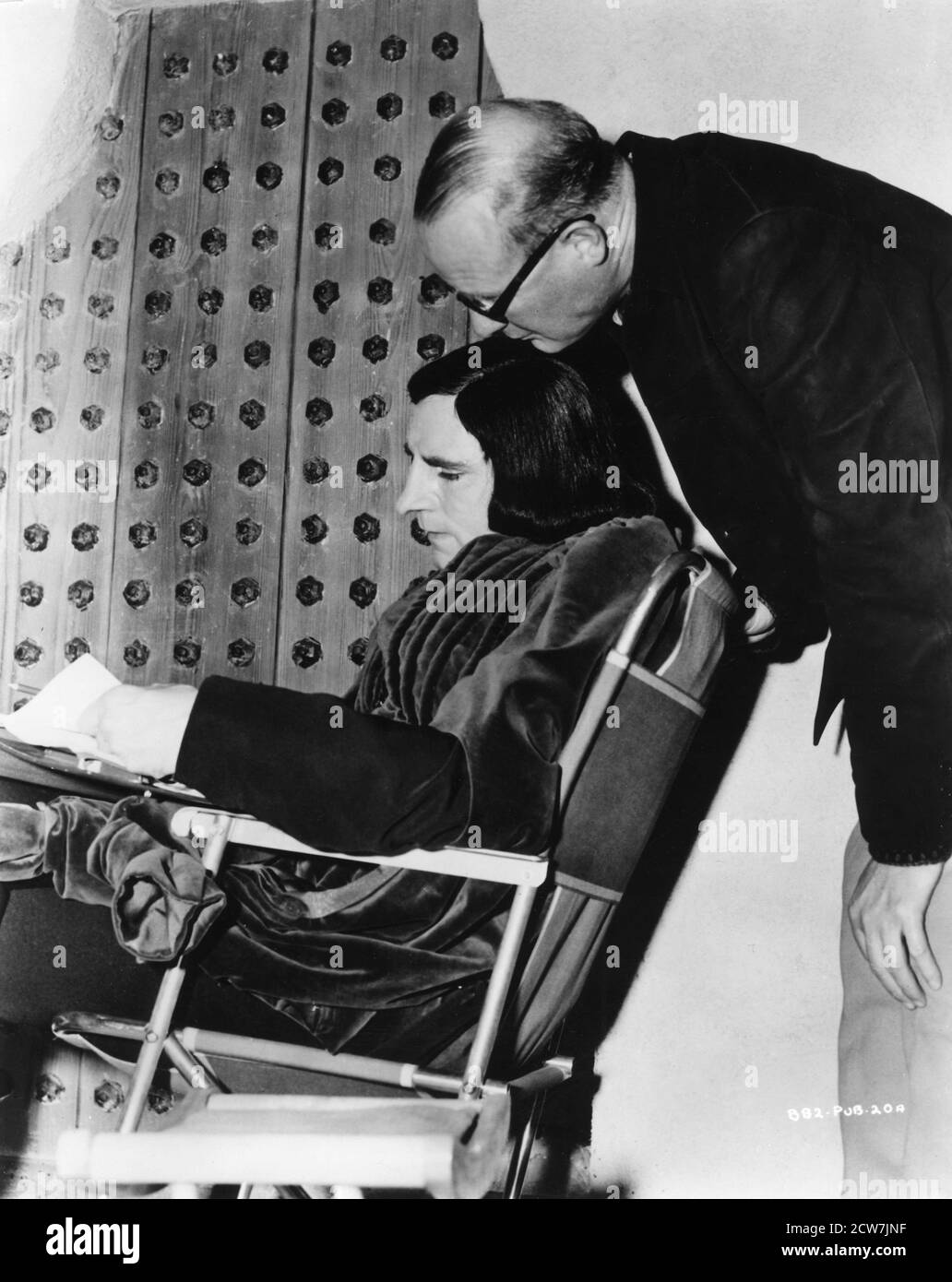 LAURENCE OLIVIER and Associate Director ANTHONY BUSHELL on set candid during filming of RICHARD ...