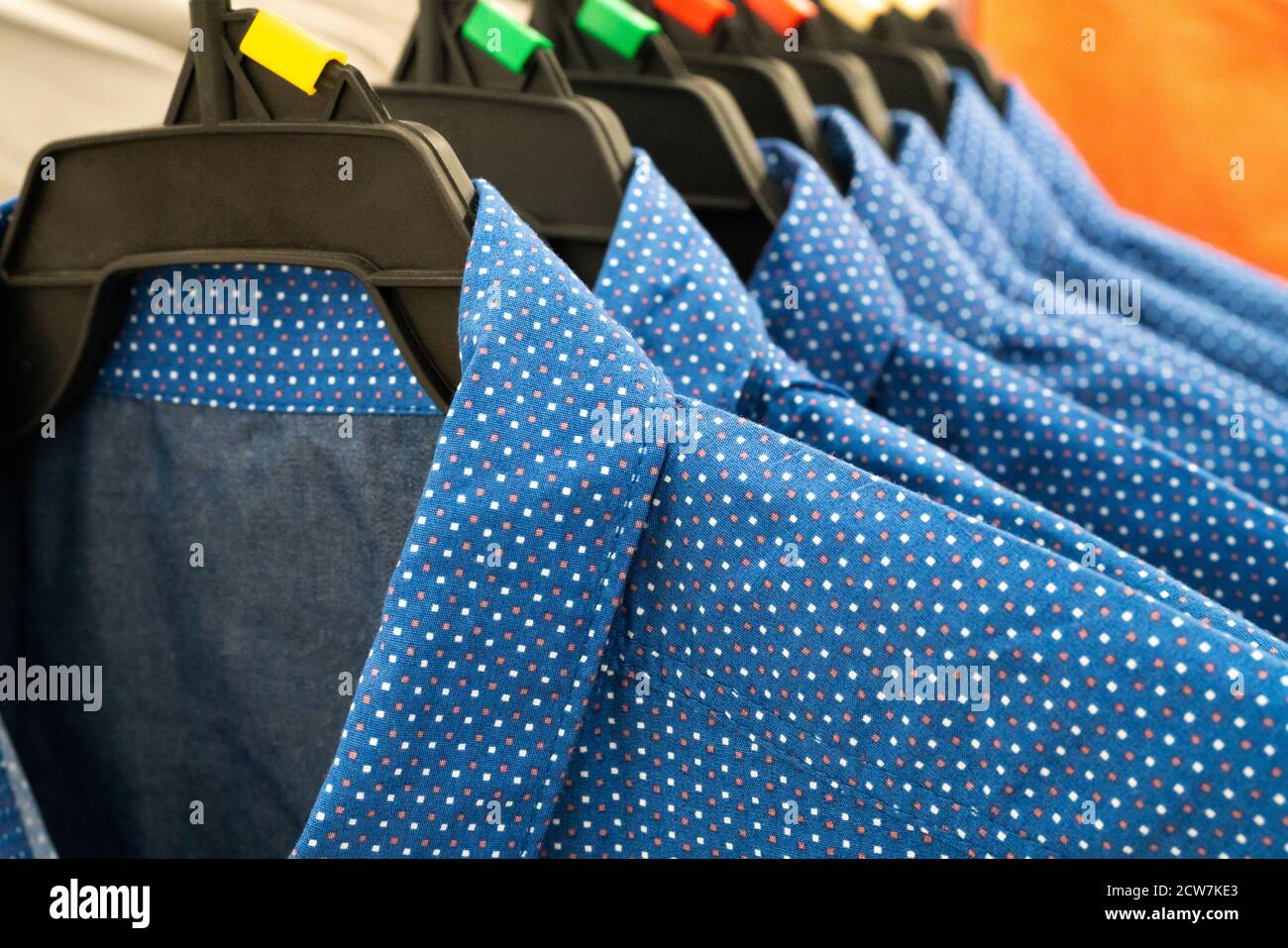 Row of striped shirts hi-res stock photography and images - Alamy
