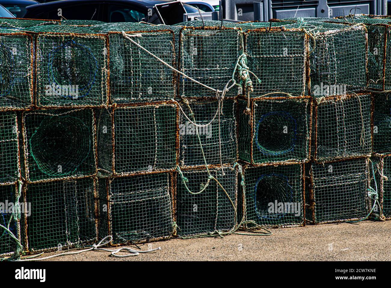 Commercial fish traps on a harbour in Catalonia, Spain Stock Photo - Alamy
