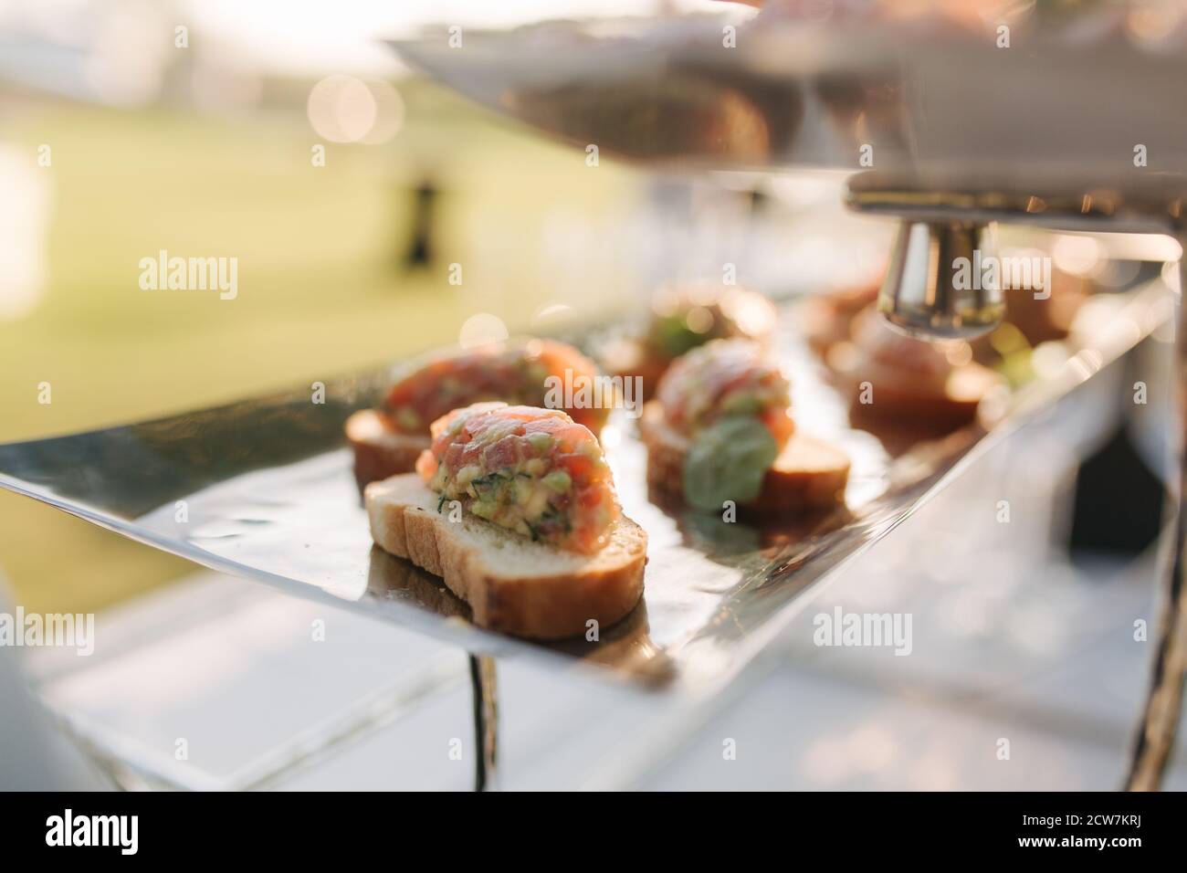 Different luzury snacks and antipasto on party. Gig table with snack ...