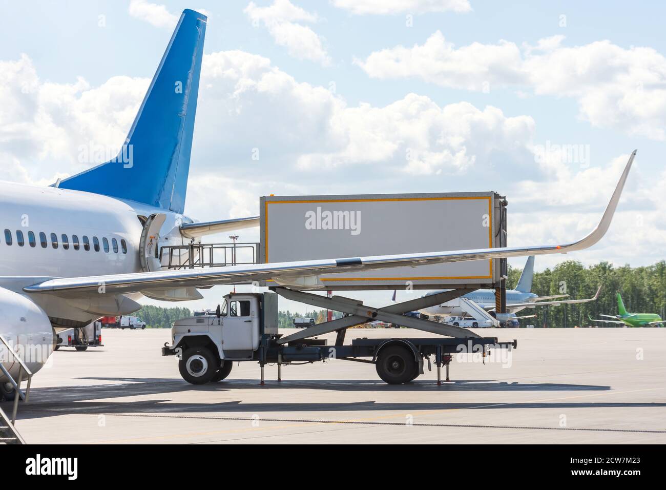 Loading food and other service items for a passenger plane flight Stock ...