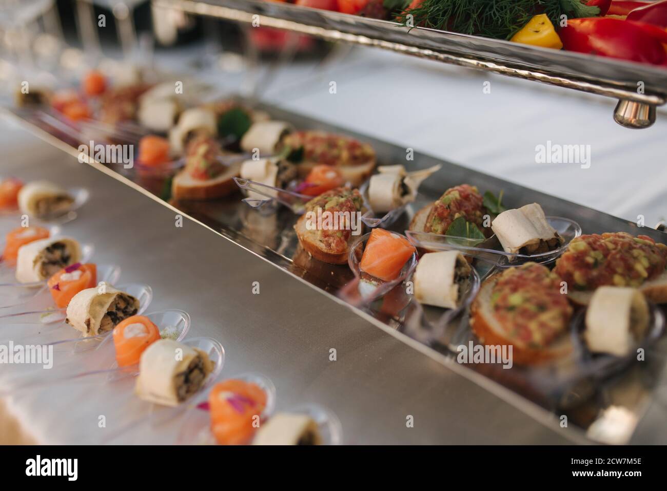 Different luzury snacks and antipasto on party. Gig table with snack ...