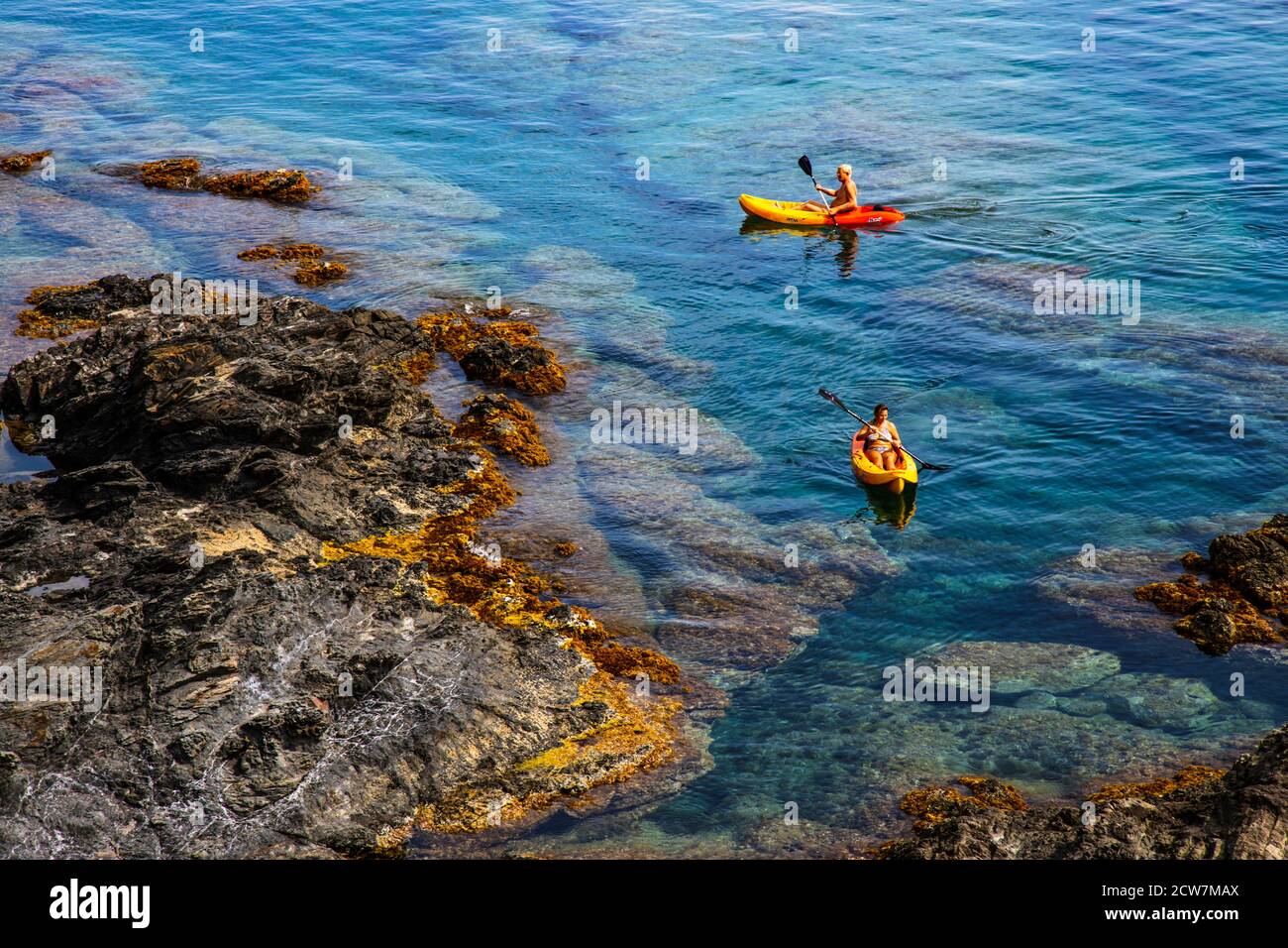Kayaking along the Costa Brava inlets in Llanca, Costa Brava, Catalonia ...