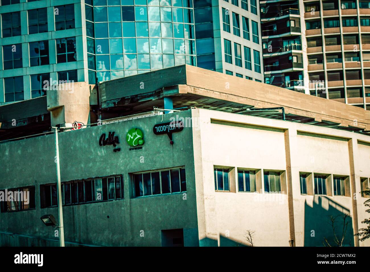 View of the facade of a modern building in the streets of Tel Aviv in ...