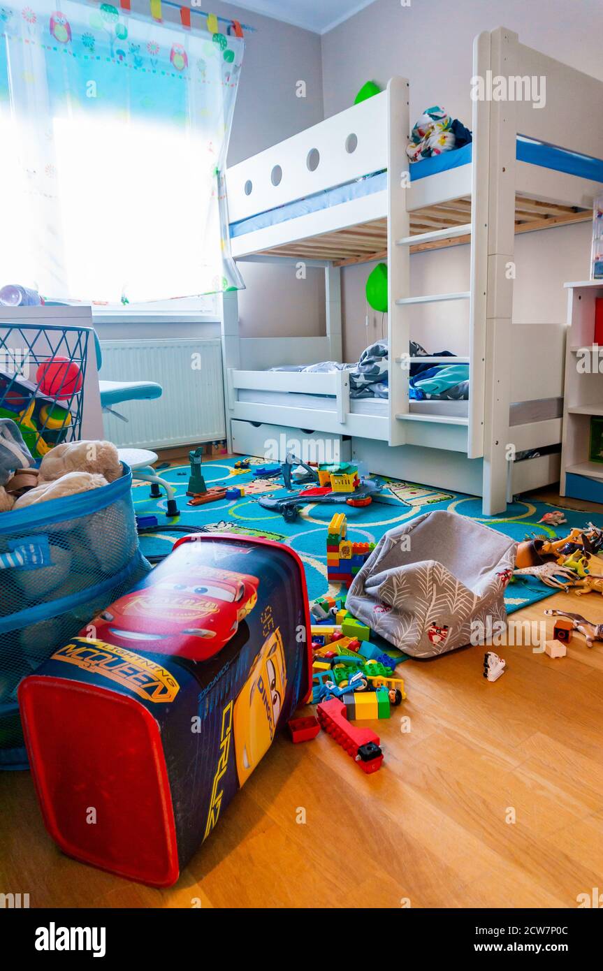 POZNAN, POLAND - Sep 13, 2020: Messy child room with toys laying on the ...