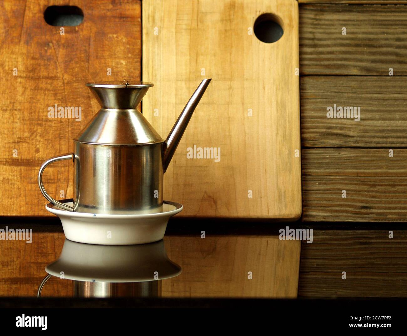 steel pot with oil and cutting boards Stock Photo - Alamy