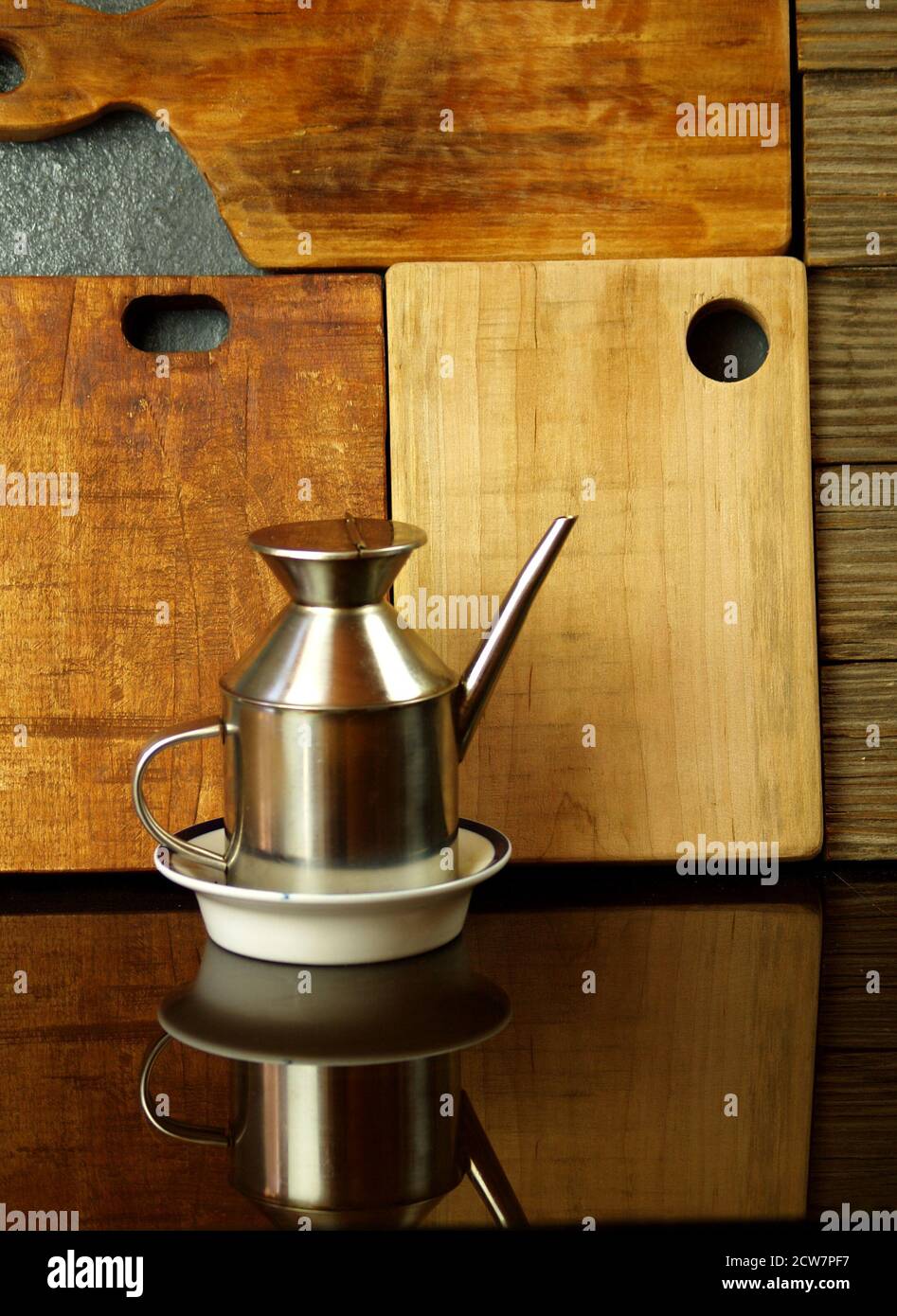steel pot with oil and cutting boards Stock Photo - Alamy