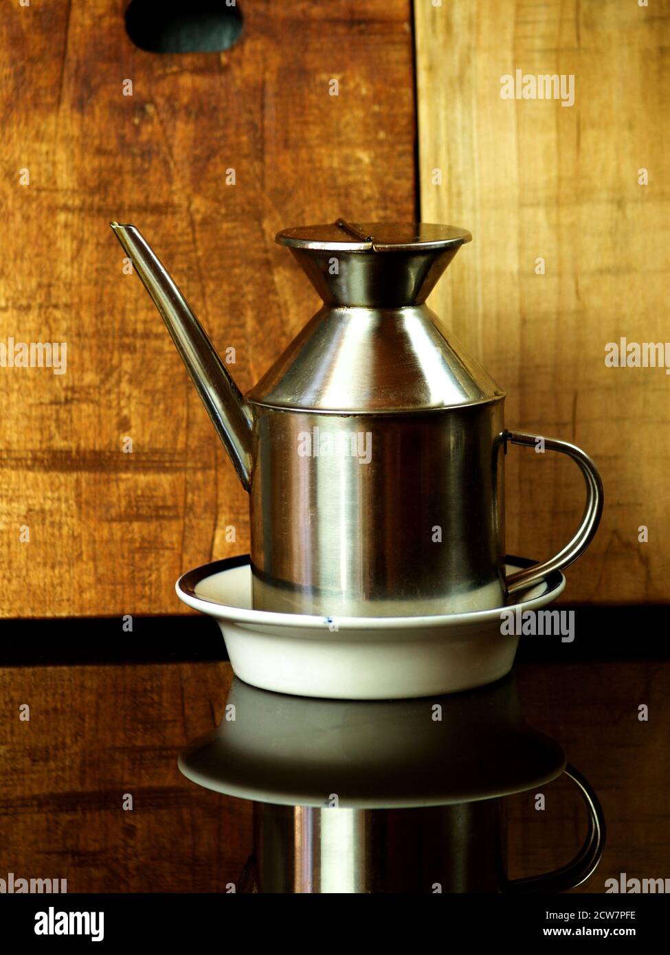 steel pot with oil and cutting boards Stock Photo - Alamy