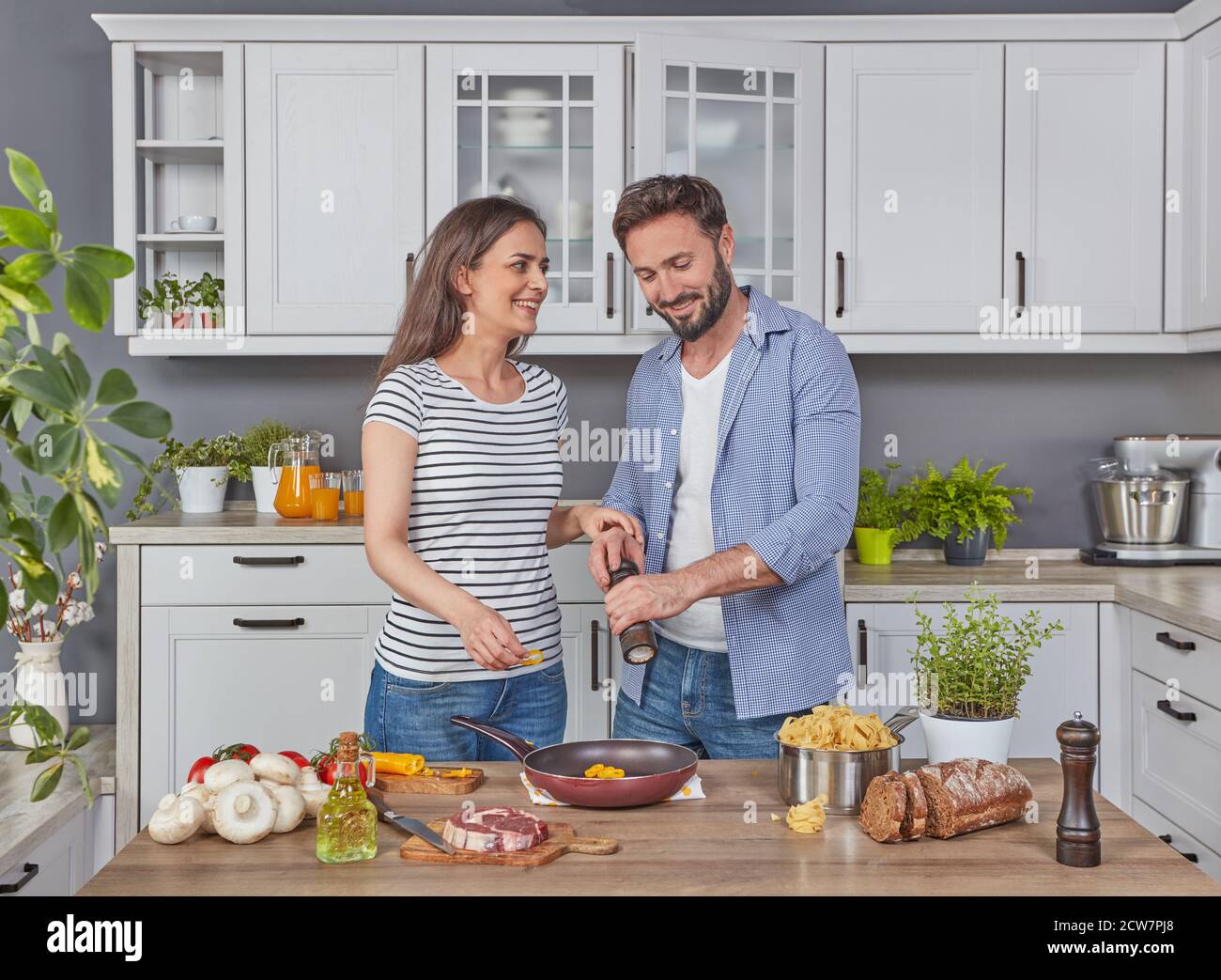 Women only cooking together home hi-res stock photography and images ...