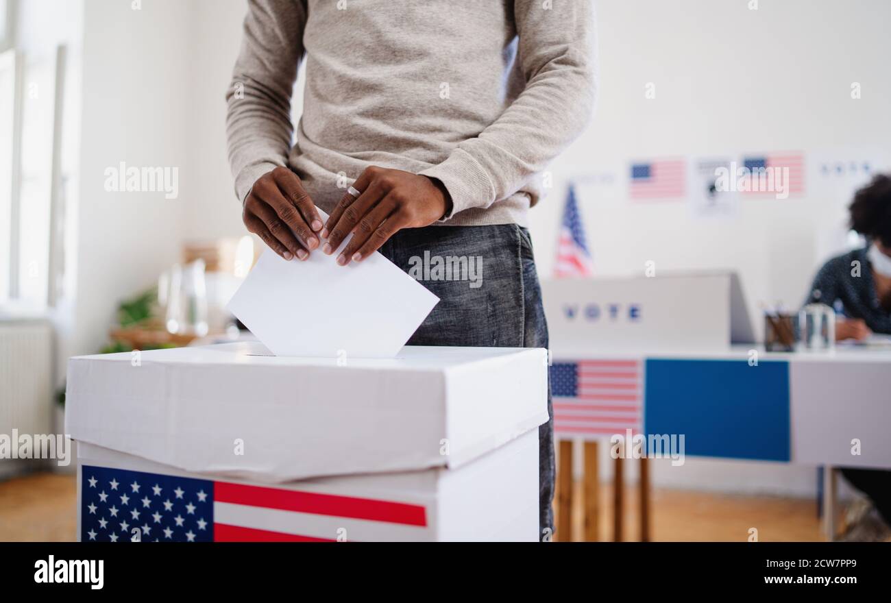 Voting hands ballot box hi-res stock photography and images - Alamy
