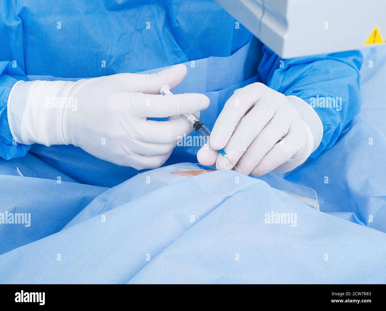 Doctor performing eye surgery Stock Photo - Alamy