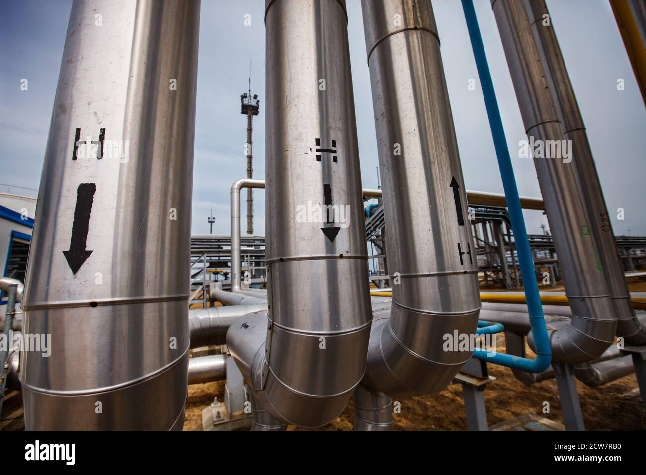 Grey metal Technological tubes (pipes) with arrows and Hydrogen "H ...