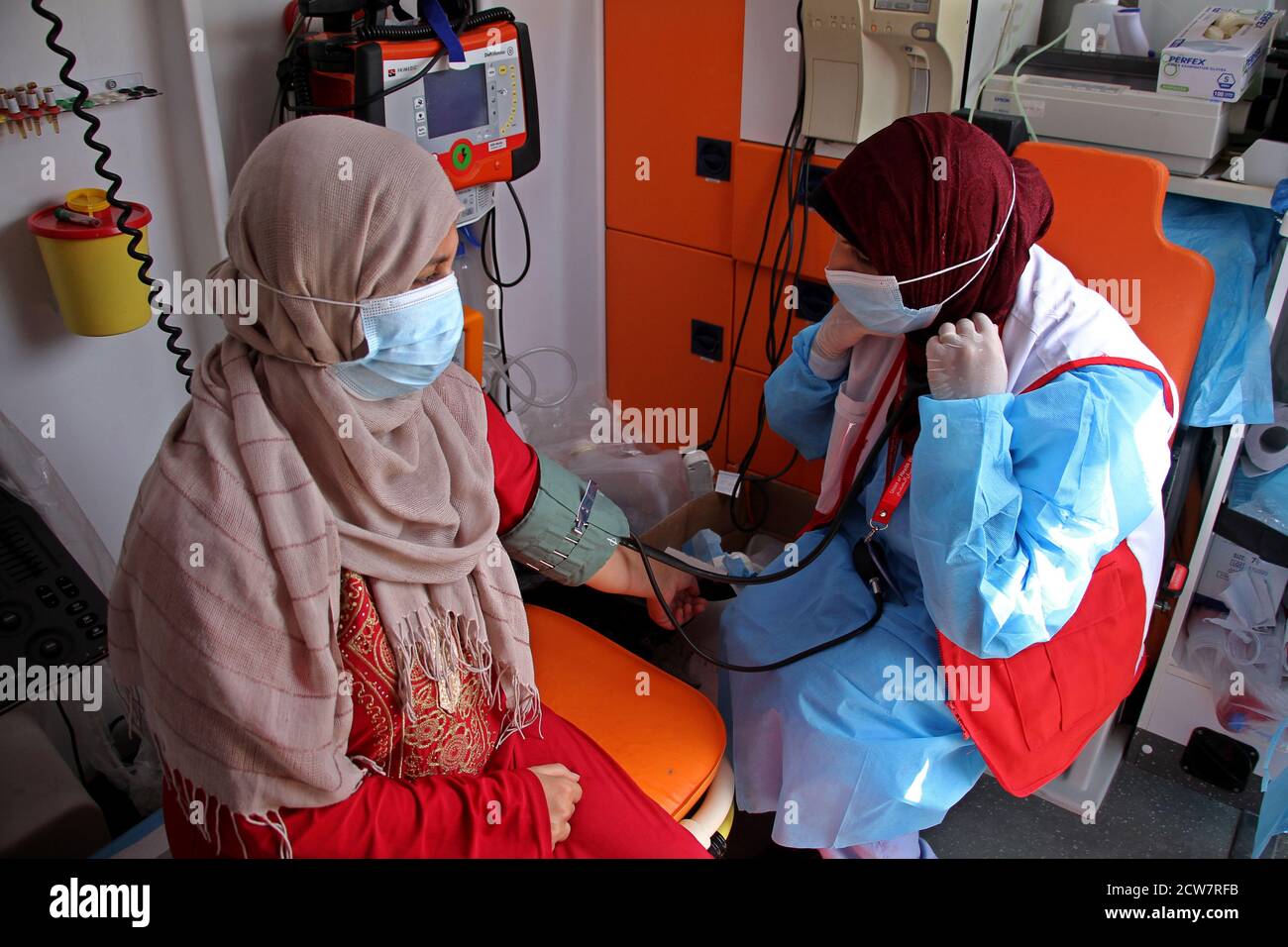 Gaza City. 28th Sep, 2020. A Palestinian medical worker provides free ...