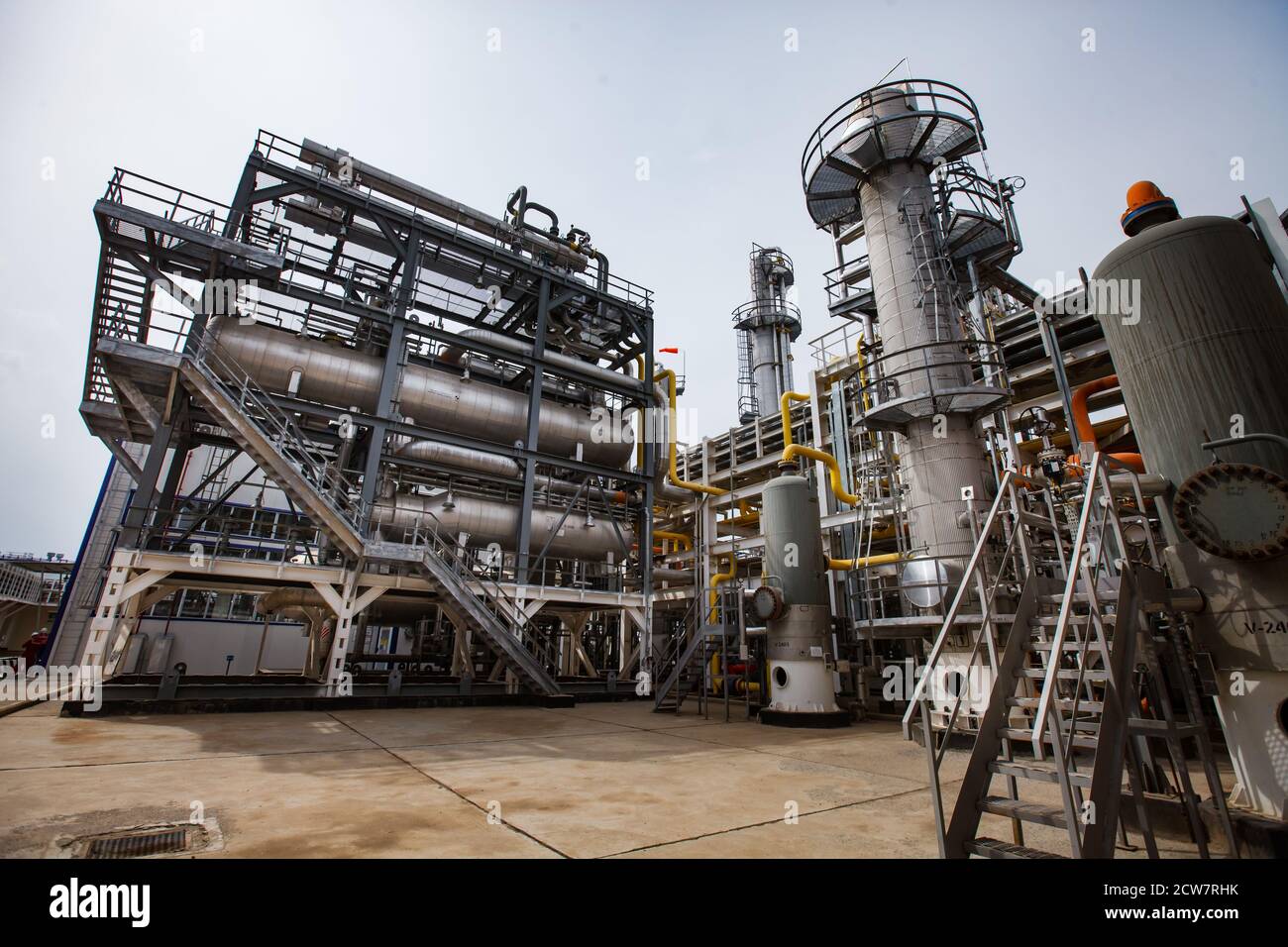 Zhaik-Munai oil deposit, Kazakhstan. Oil refinery and gas processing ...
