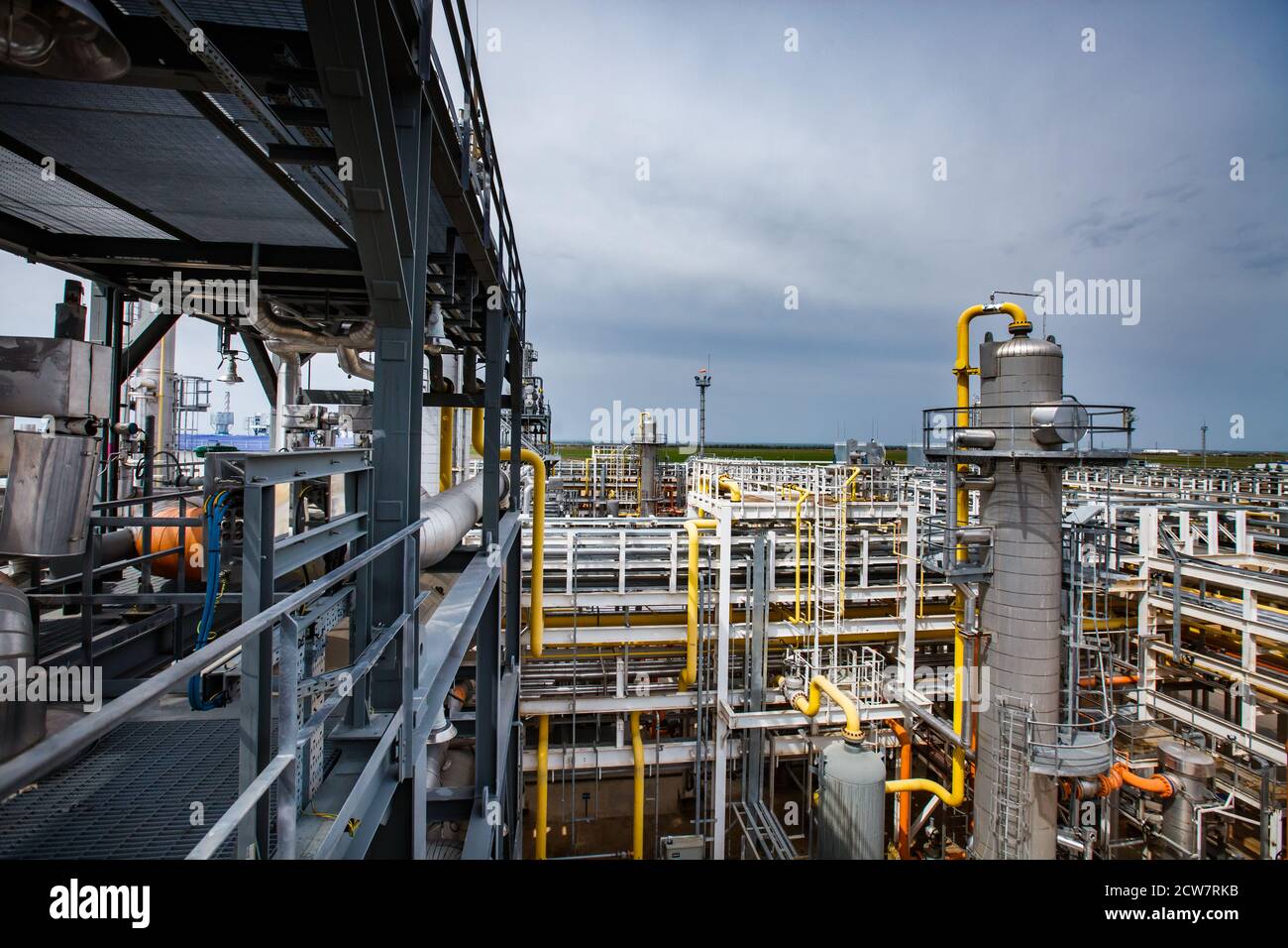 Oil refinery and gas processing plant. Distillation towers (refining ...