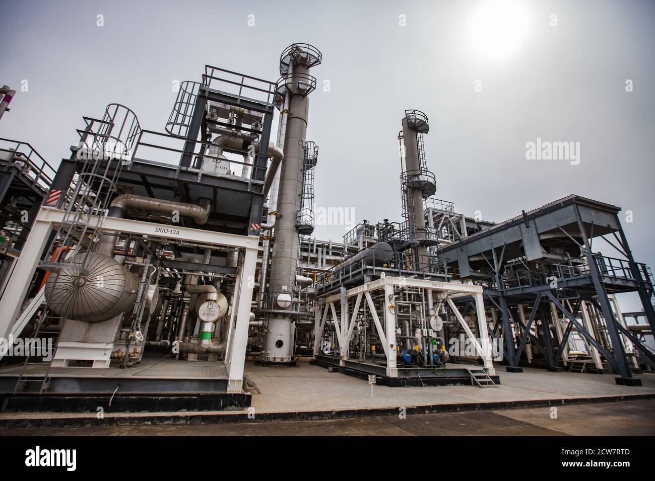 Oil refinery and gas processing plant. pipelines and distillation ...