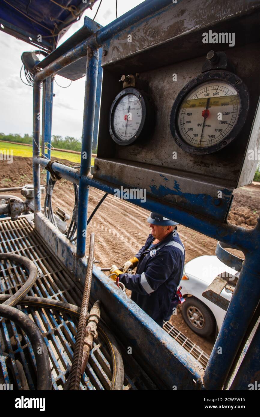 Zhaik-Munai oil deposit, Kazakhstan. Drilling rig mud pump control ...