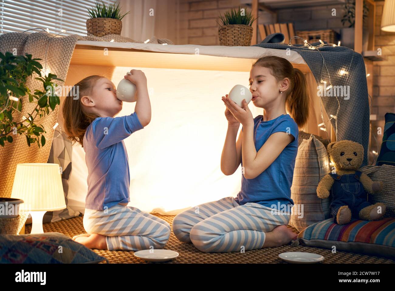 Children playing tea party hi-res stock photography and images - Alamy