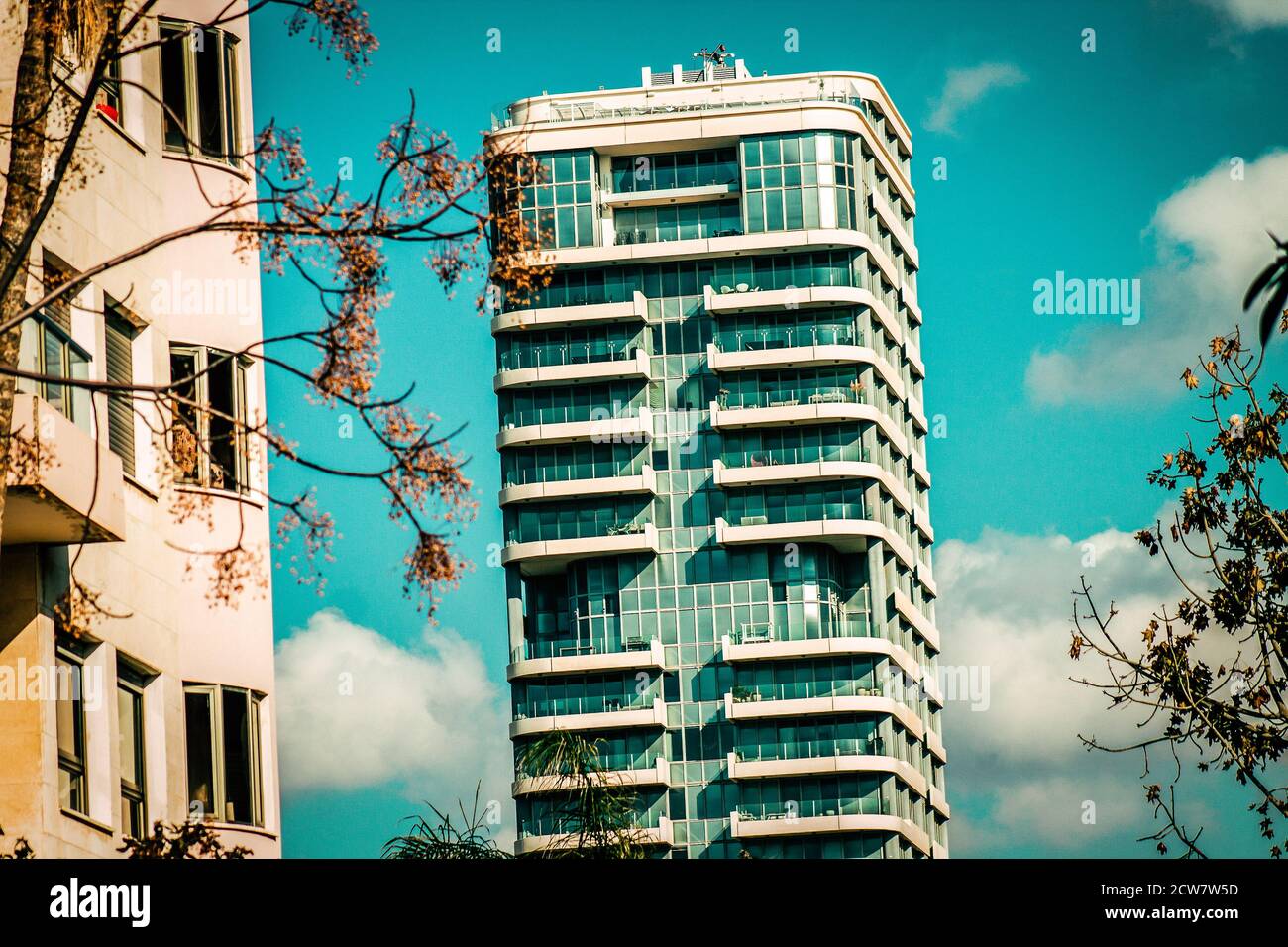 View of the facade of a modern building in the streets of Tel Aviv in ...
