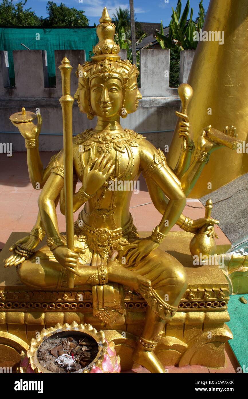 Four-faced golden Brahma figue at the Buddhist temple of Wat Phong ...