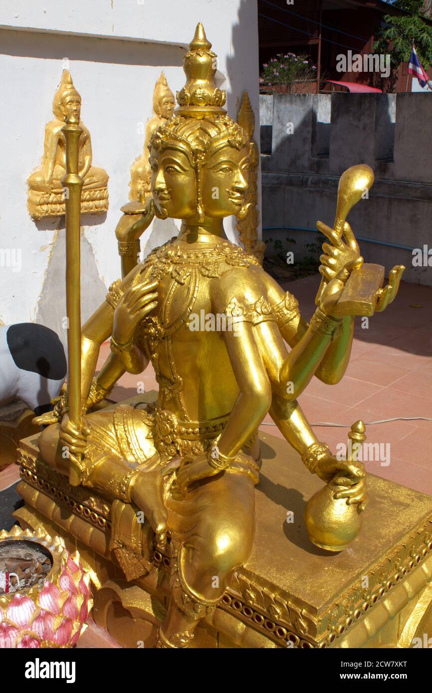 Four-faced golden Brahma figue at the Buddhist temple of Wat Phong ...