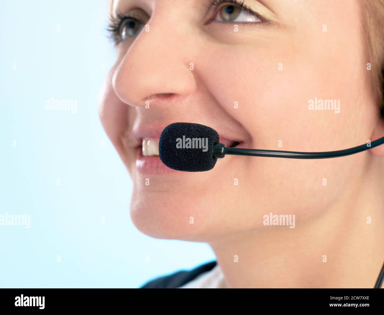 Hotel receptionist working headset hi-res stock photography and images ...