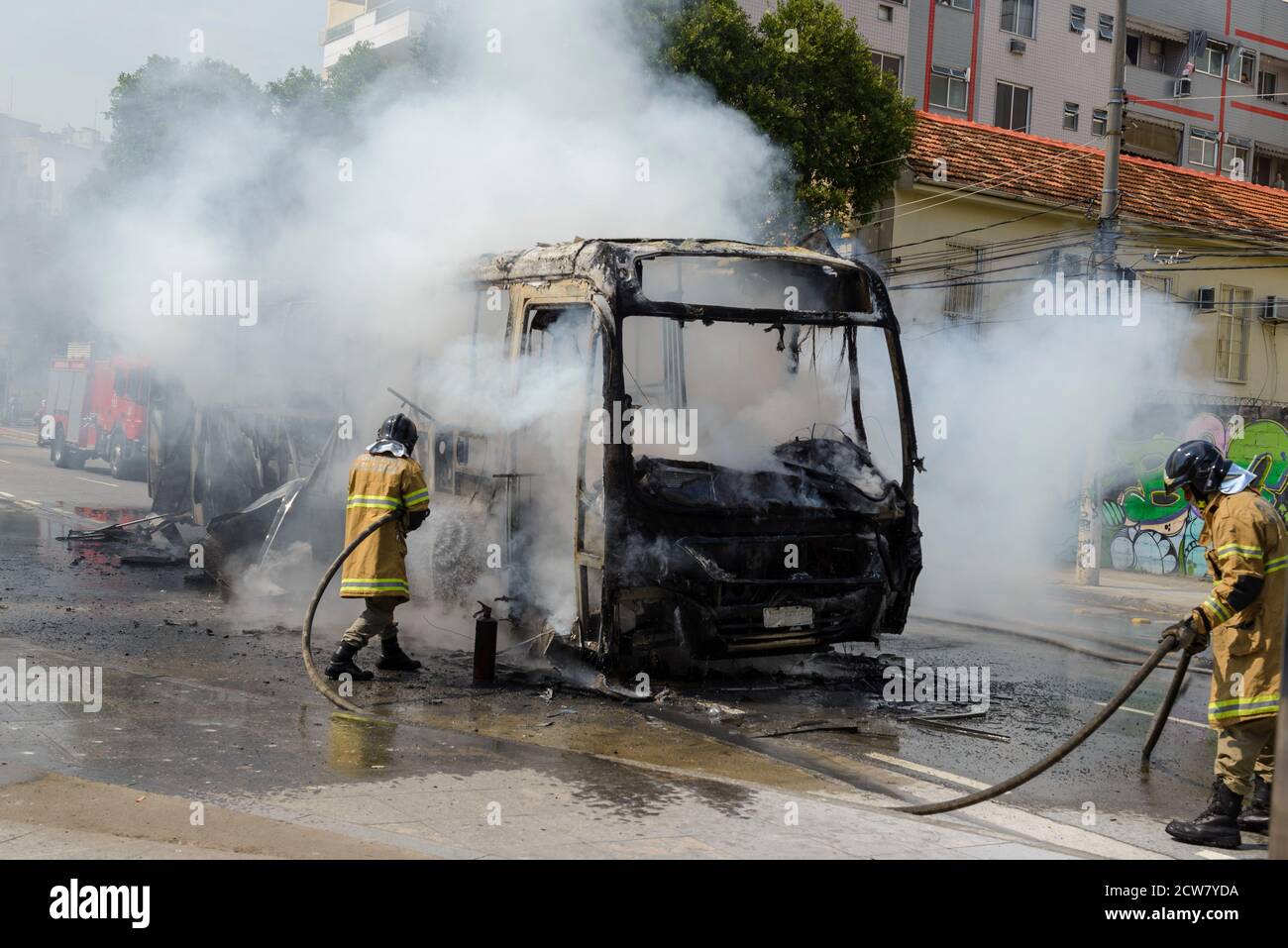 Rio, Brazil - september 28, 2020: fire brigade fighting a fire on bus ...