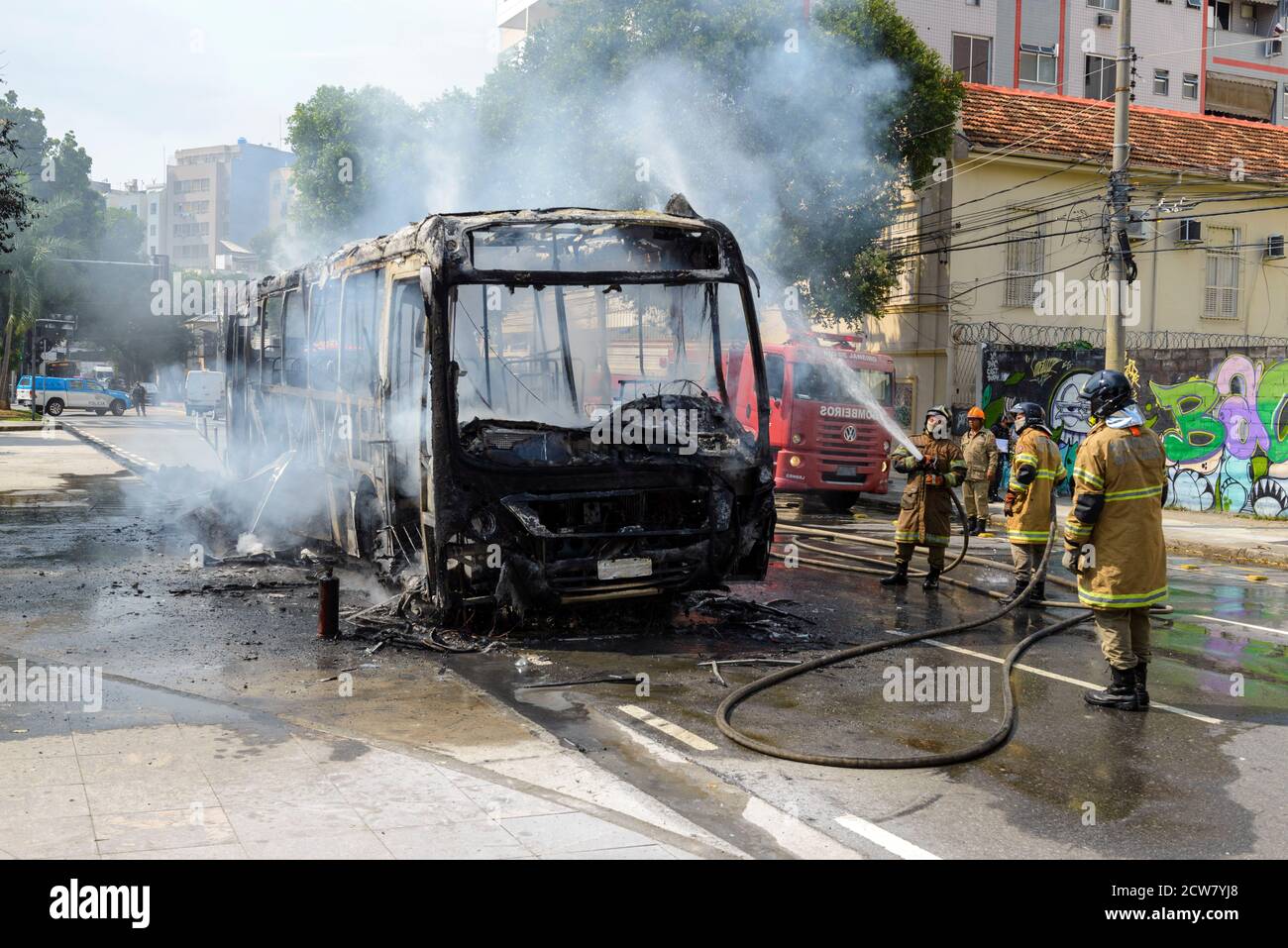 Rio, Brazil - september 28, 2020: fire brigade fighting a fire on bus ...