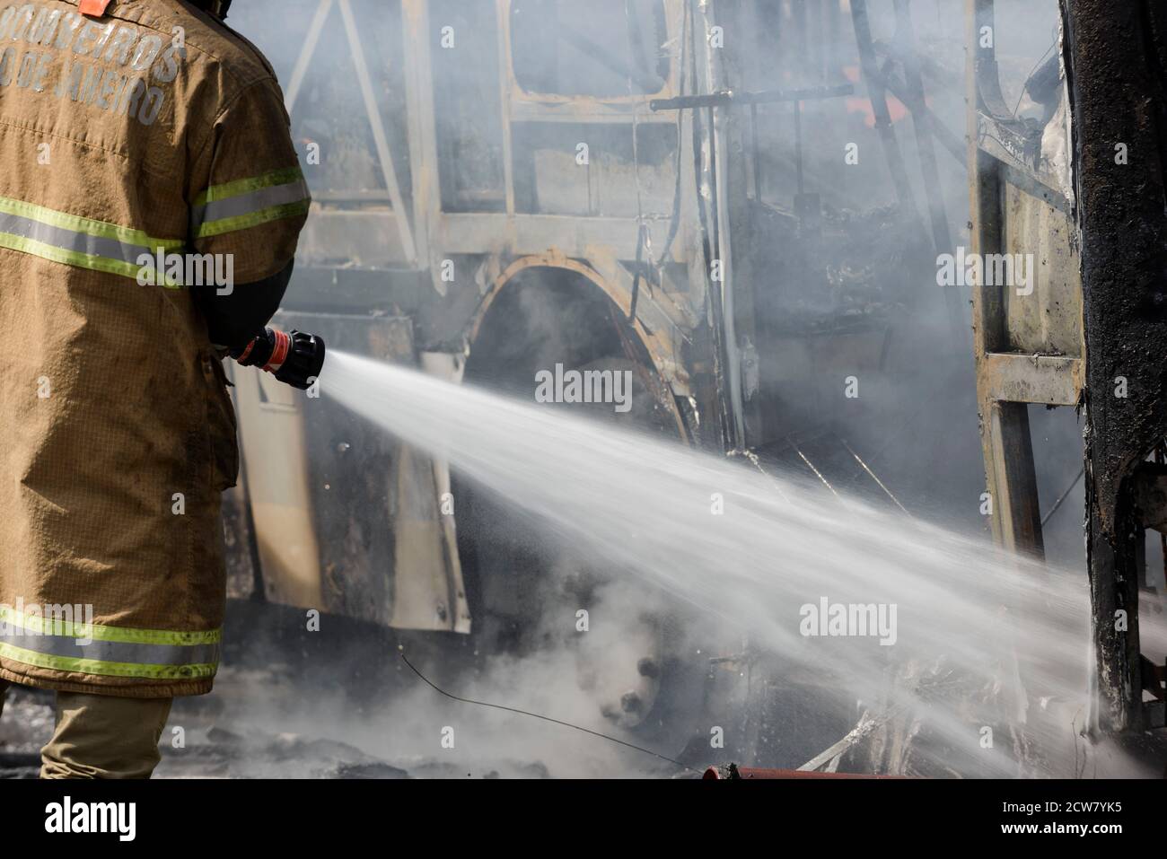 Rio, Brazil - september 28, 2020: fire brigade fighting a fire on bus ...