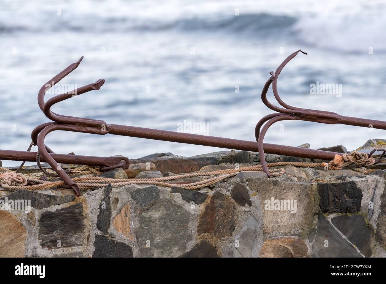 RUNDE, NORWAY - 2017 JANUARY 27. Anchors on a rock at Runde Harbor ...