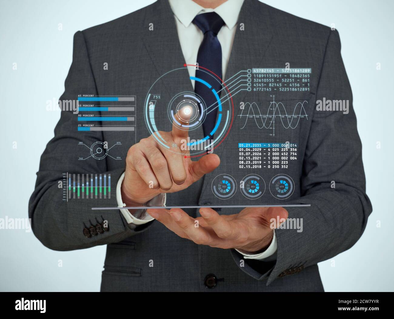 Businessman using a digital virtual touch screen Stock Photo - Alamy
