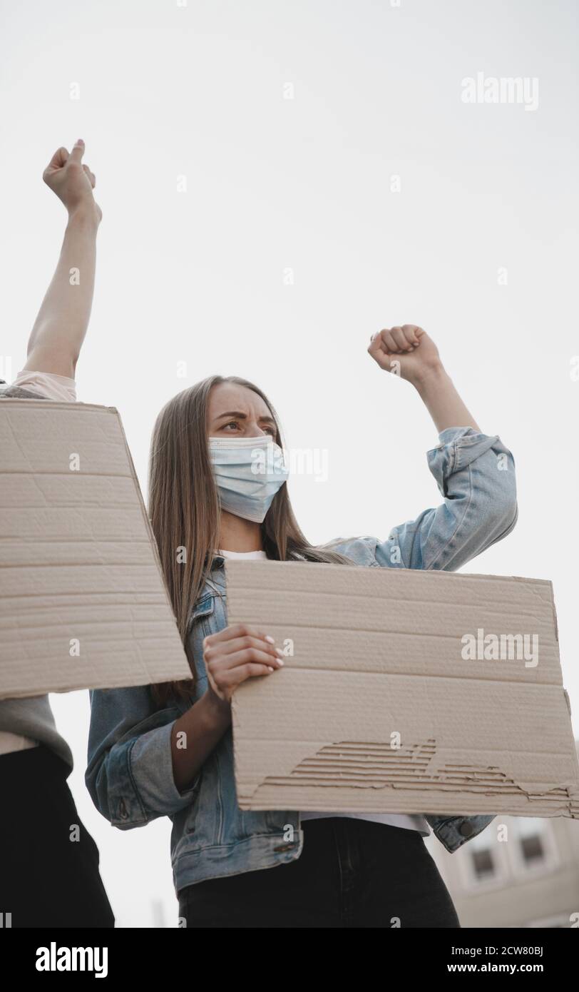 Faith. Group of activists giving slogans in a rally. Caucasian men and ...